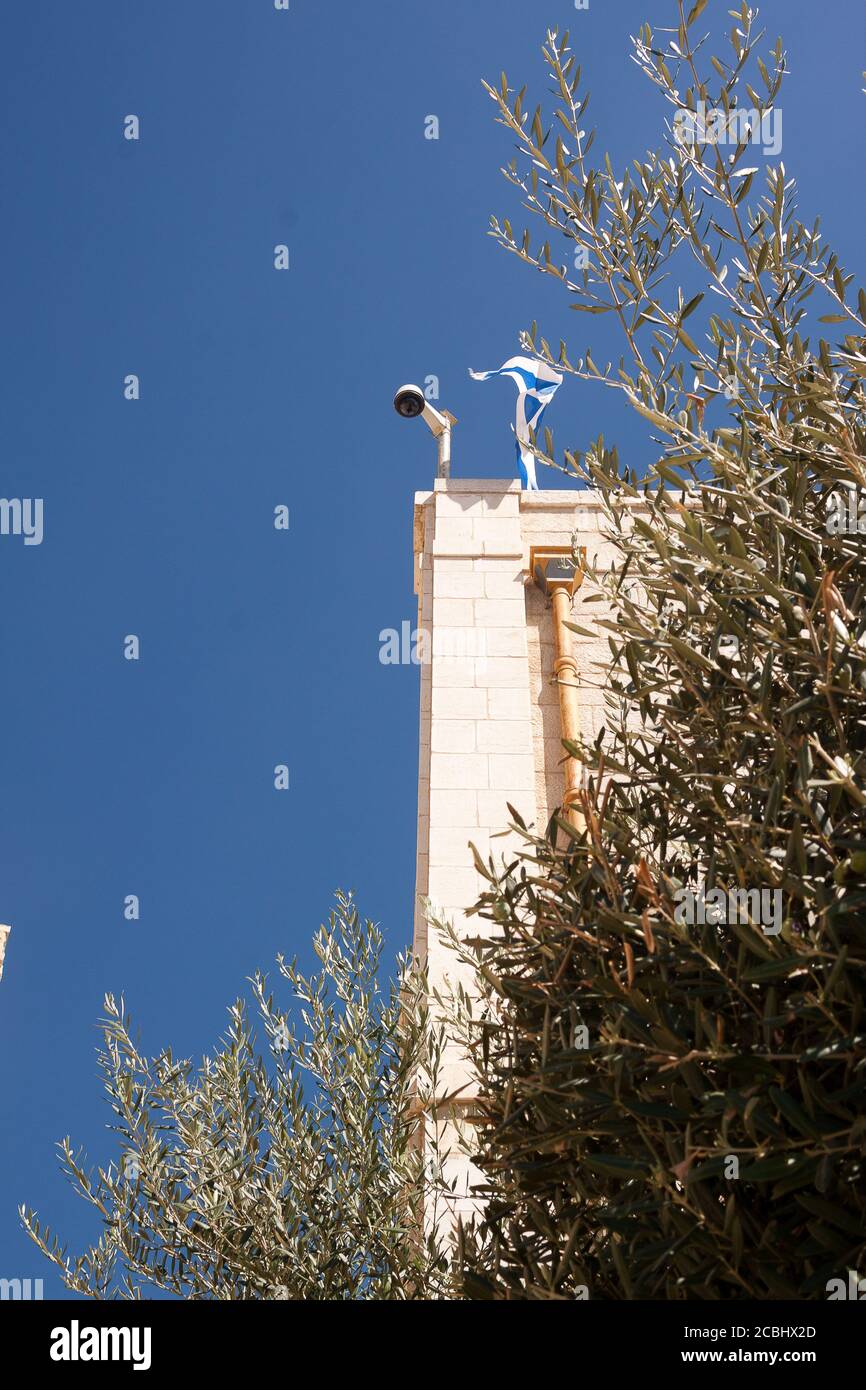 Camera surveillance and Israel Flag on the top of the building Stock ...