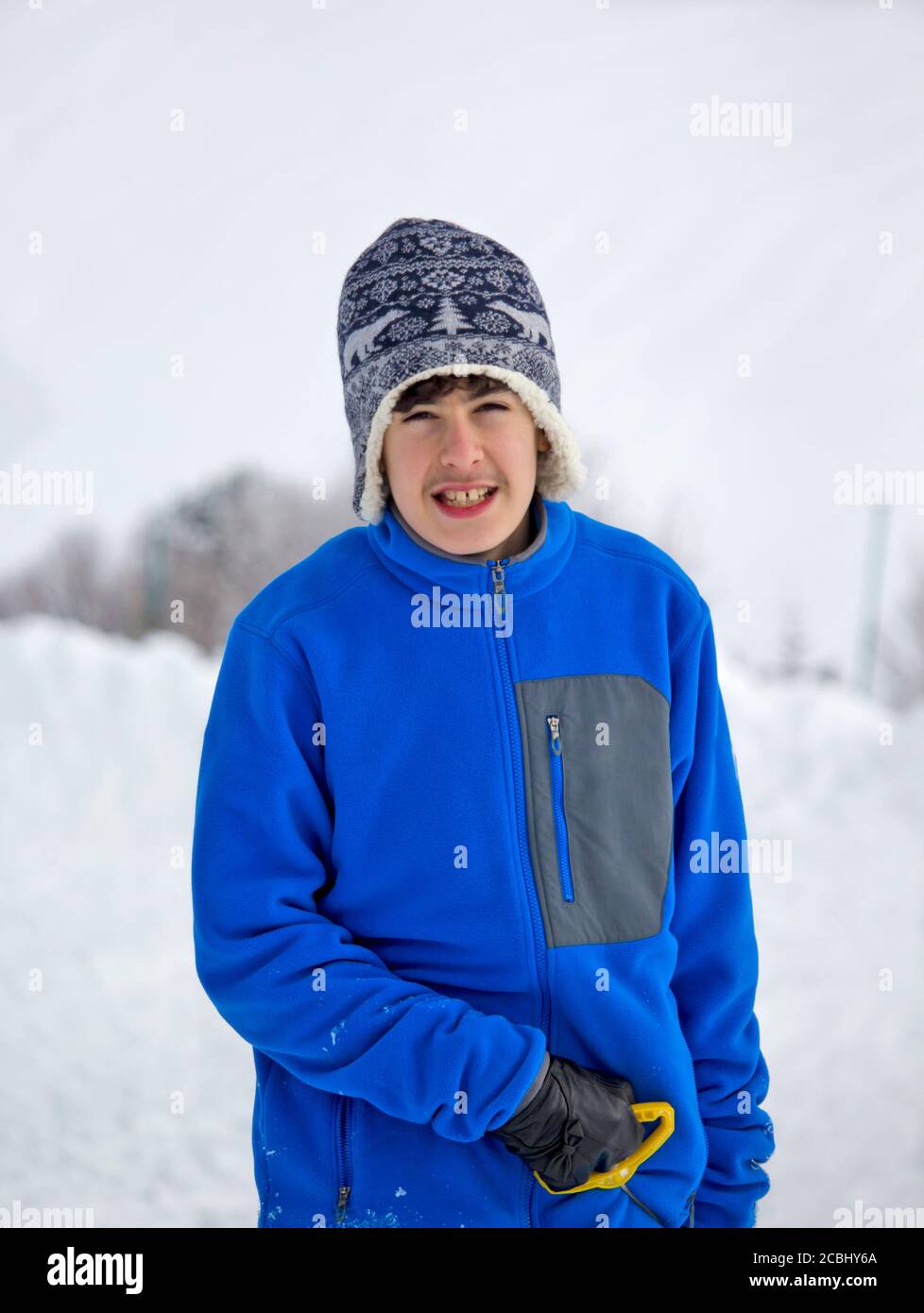 Portrait of happy boy in the snow Stock Photo - Alamy