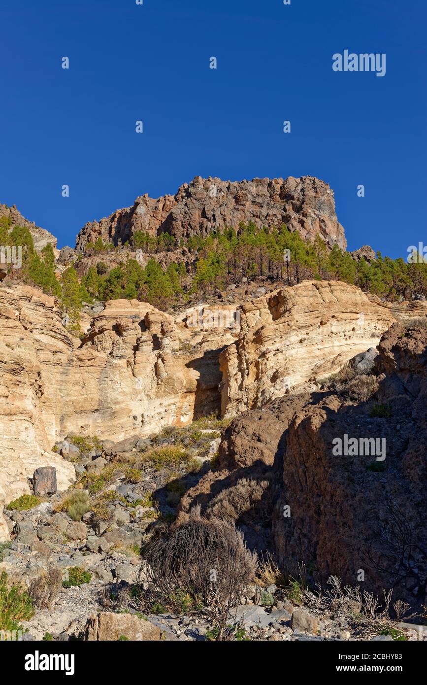 A Volcanic Plug geological feature above the steep Hillside and gorge ...