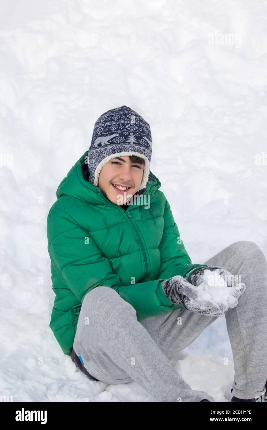 Portrait of happy boy in the snow Stock Photo - Alamy
