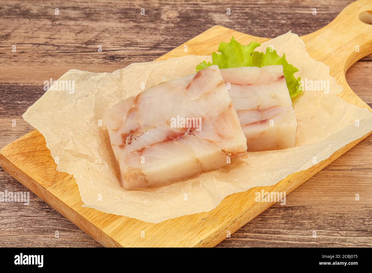 Raw dietary pollock fish fillet for cooking Stock Photo - Alamy
