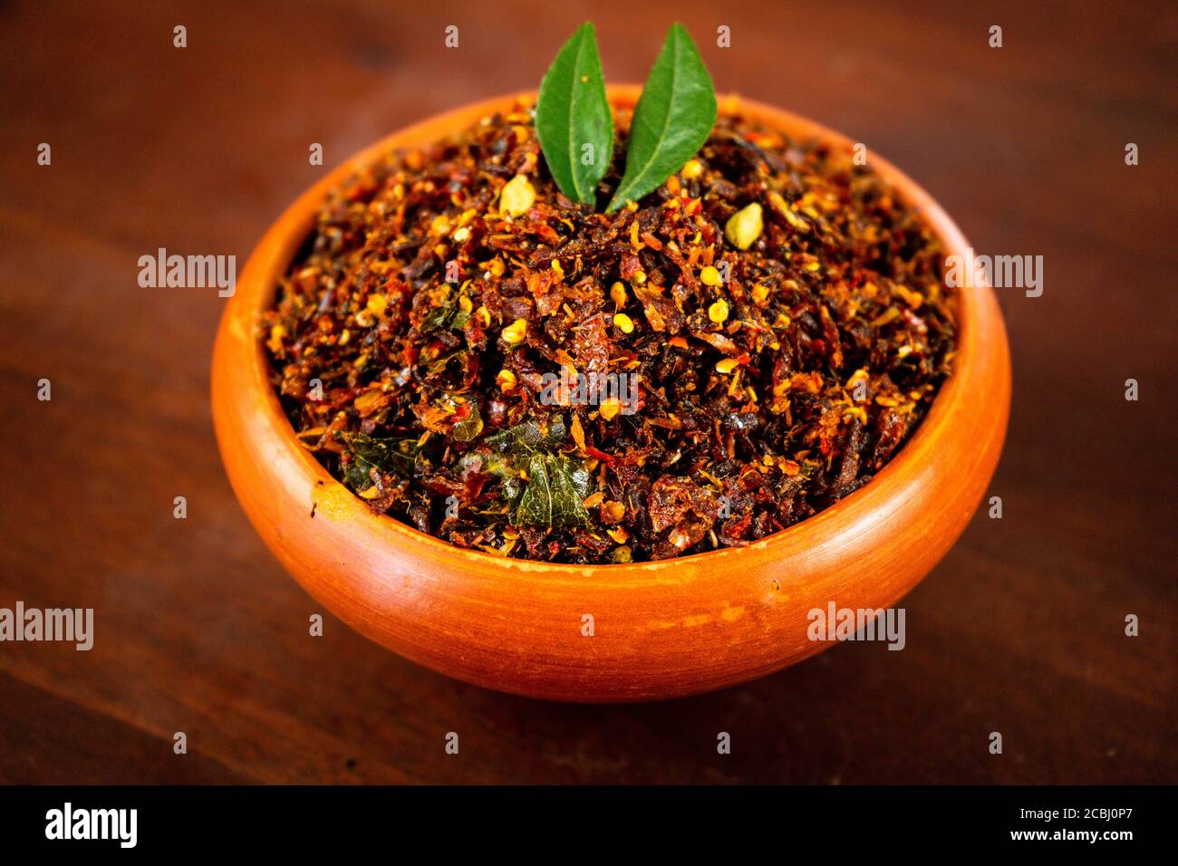 Spicy Maldives fish dish - (dried fish sambol/sambal) with leafy green ...
