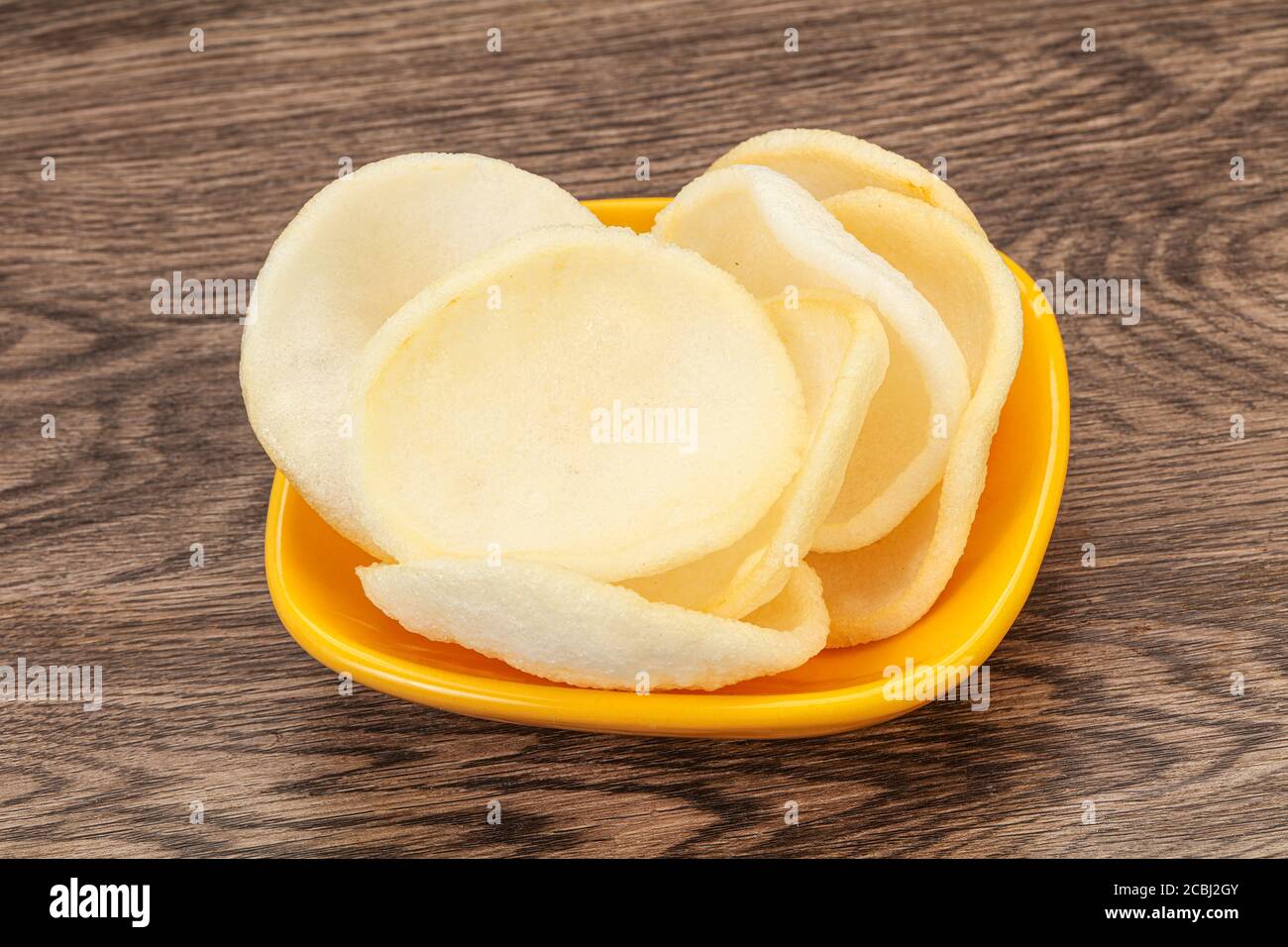 Asian cusine - homemade prawn chips in the bowl Stock Photo - Alamy
