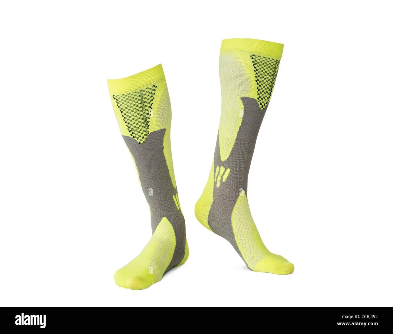 Pair of yellow sport gaiters isolated on white background Stock Photo ...