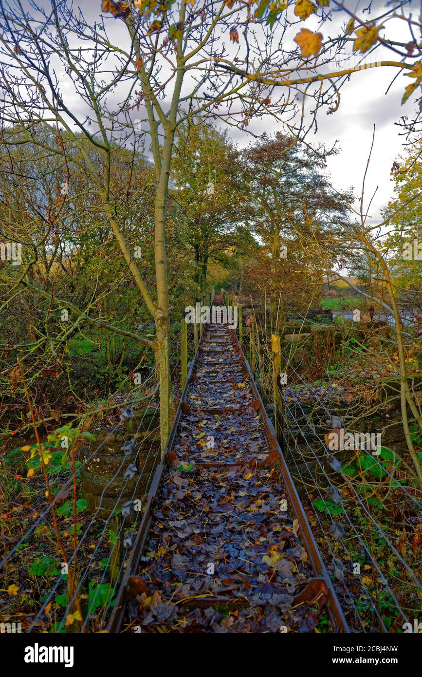 The old metal Footbridge spanning the River South Esk near to the ...