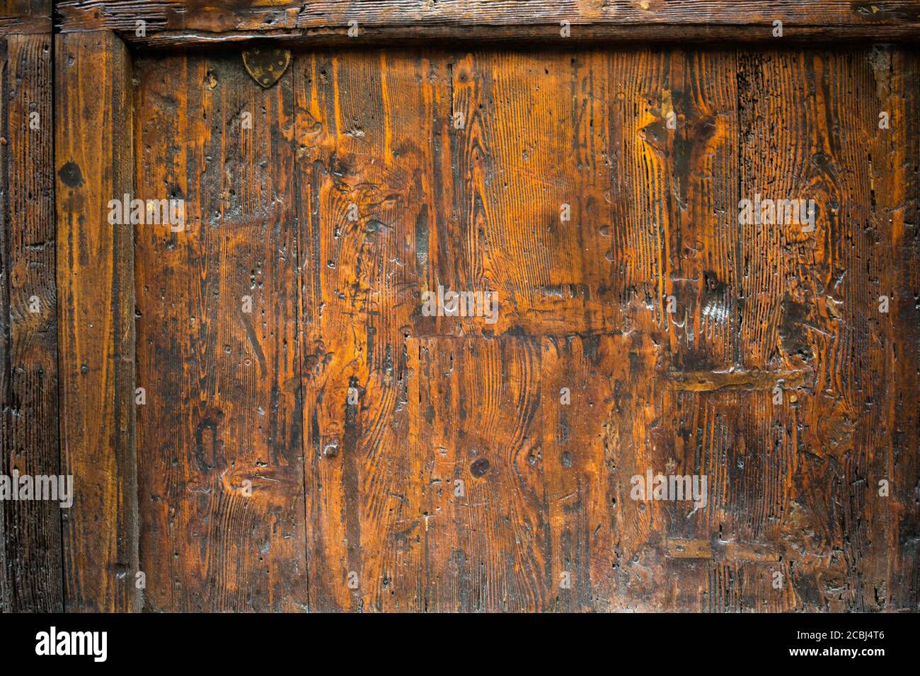 Antique wooden door. Grunge wood texture. Vintage background. Close up ...
