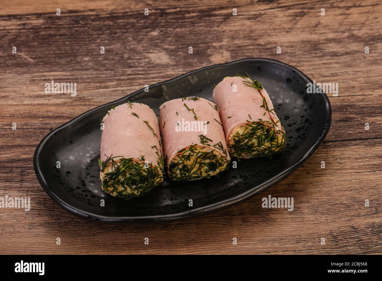 Ham roll snack with cheese and garlic Stock Photo - Alamy