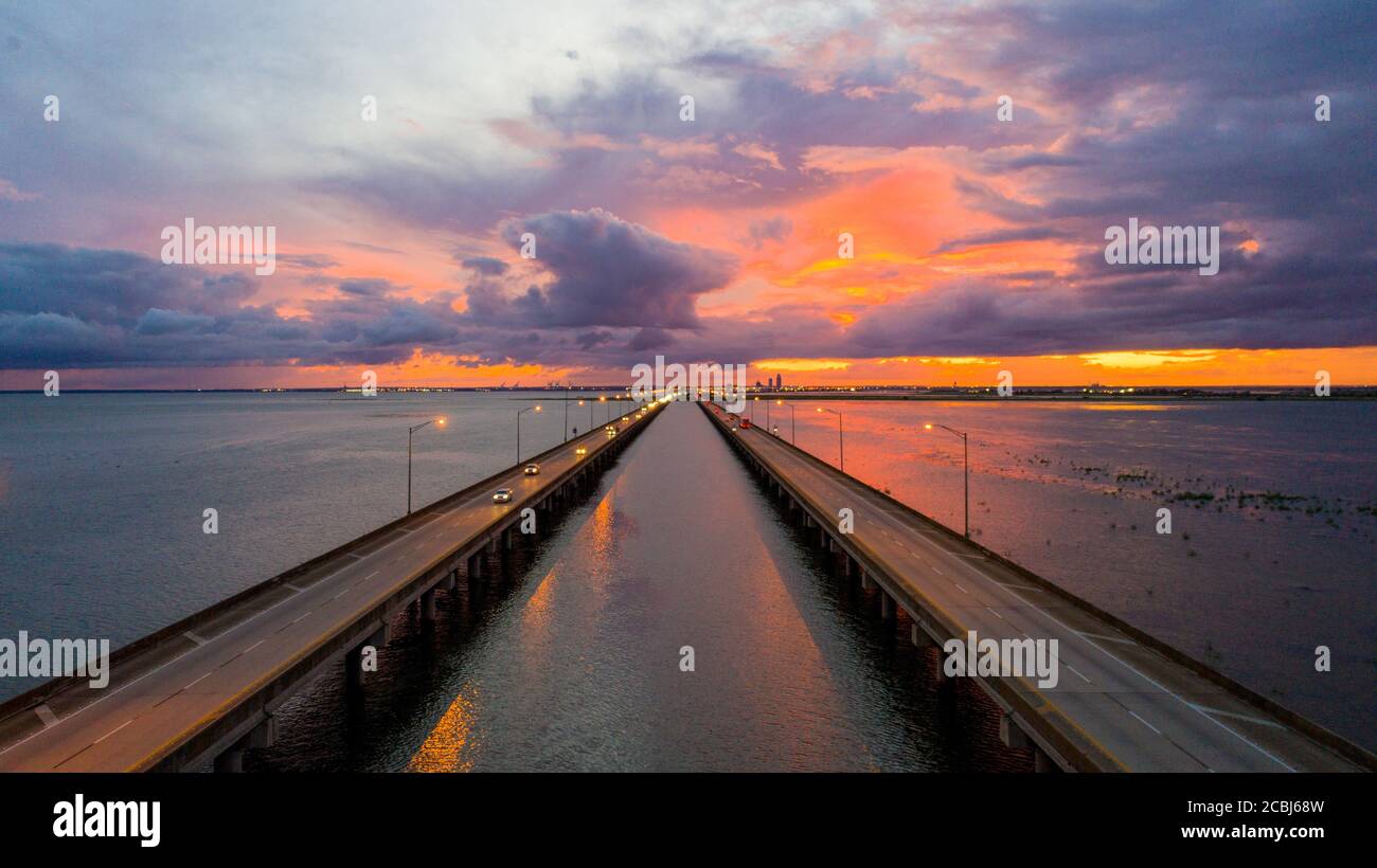 Mobile Bay and interstate 10 bridge at sunset Stock Photo - Alamy
