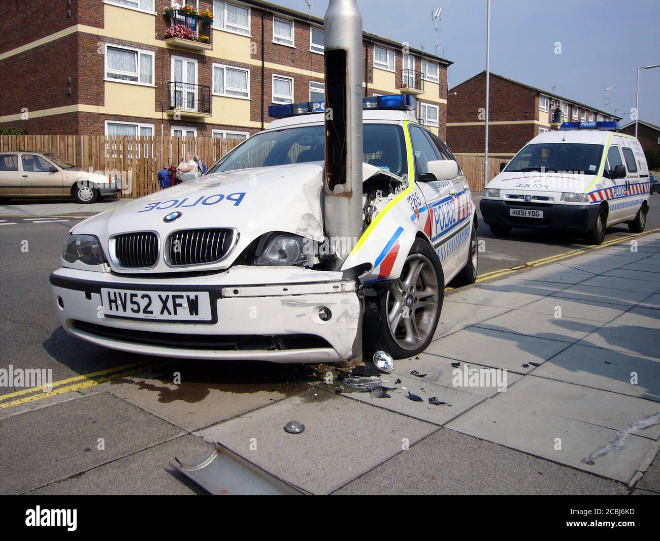 police patrol car wrapped around lamp post after collision in single ...