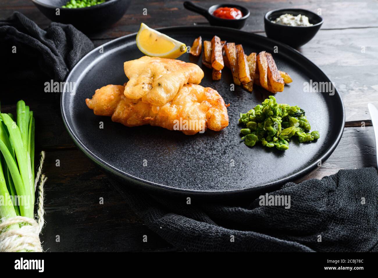 Fish and chips. Traditional british fast food hot dish consisting of fried fish, potato chips ...