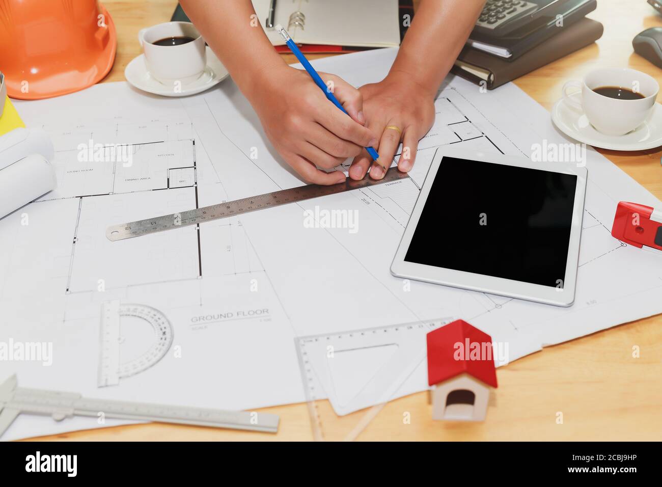 Architect working with new startup project at home office. Work from ...