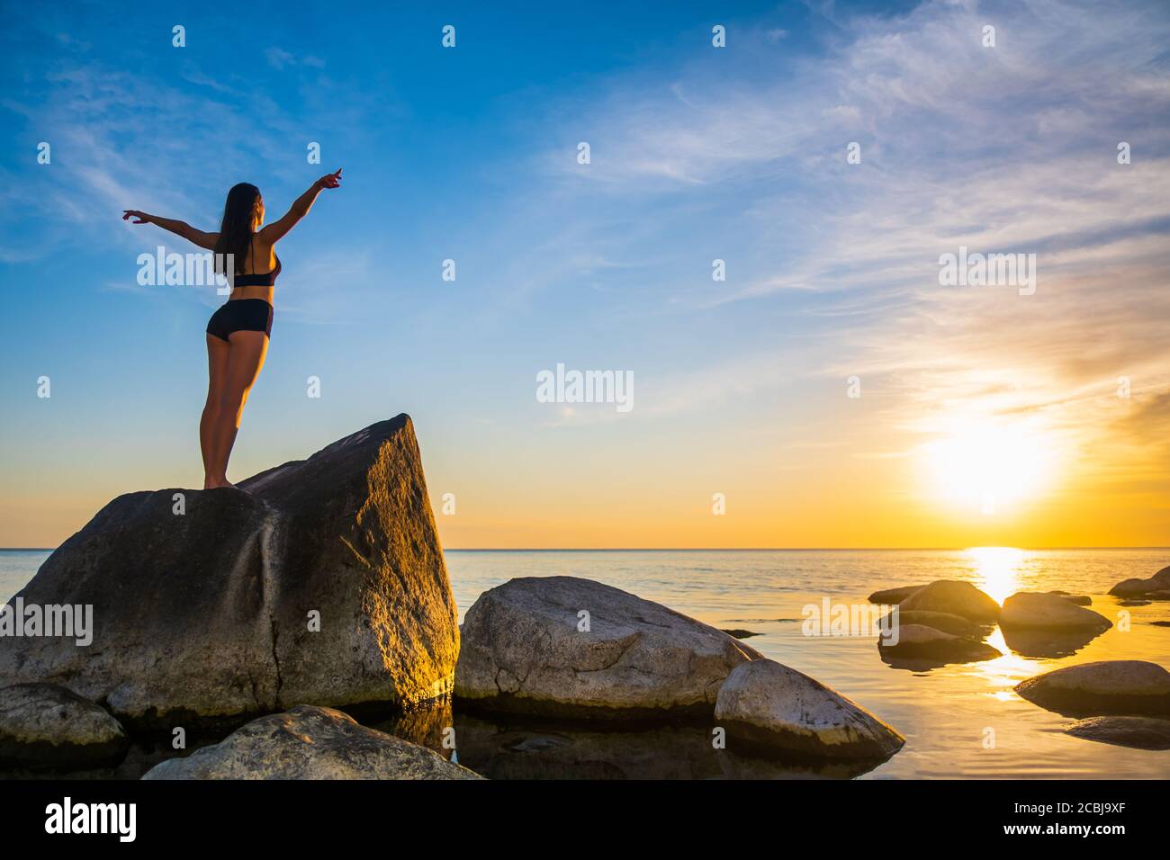 Silhouette woman enjoying vibrant hi-res stock photography and images ...