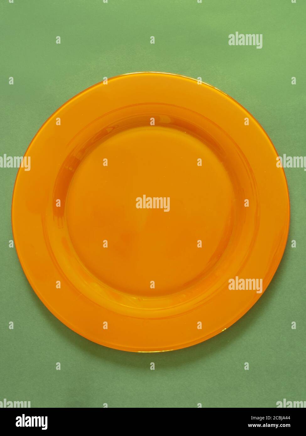 Empty orange plate on hi-res stock photography and images - Alamy