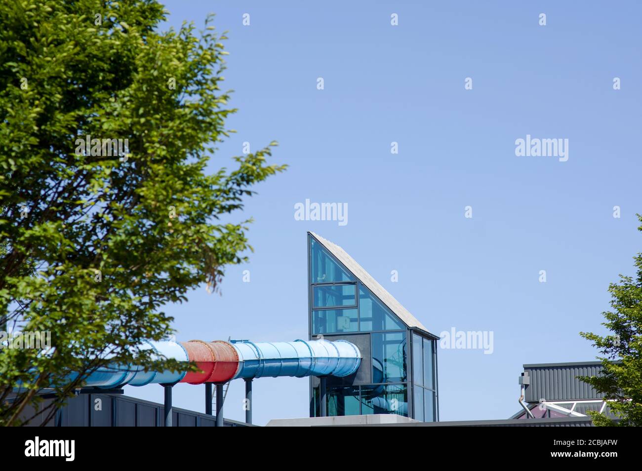 Building with a large tube of a water slide in Arnhem, Netherlands ...