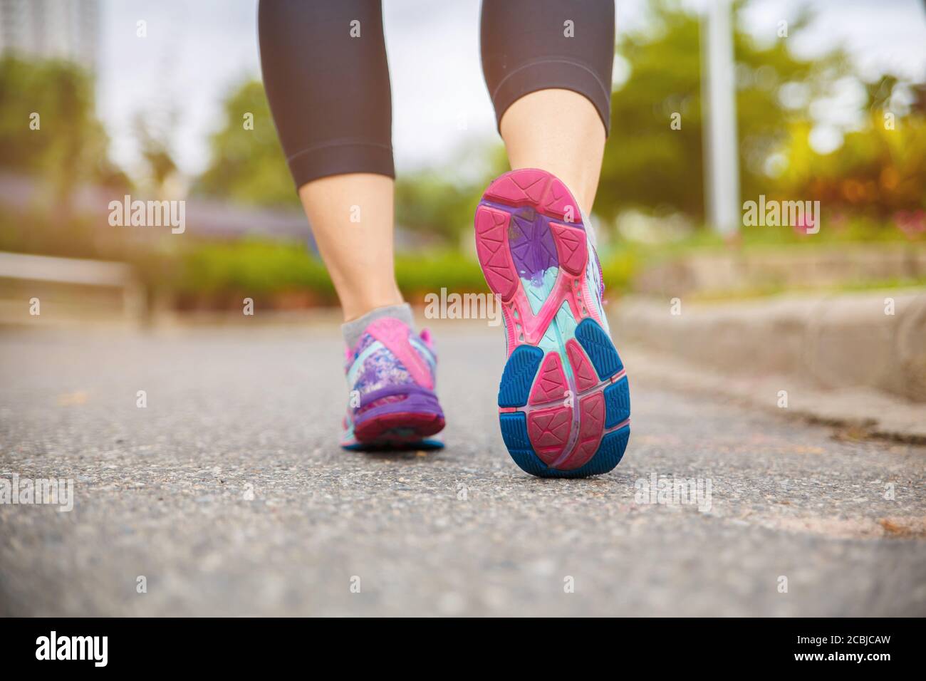Female feet running hi-res stock photography and images - Alamy