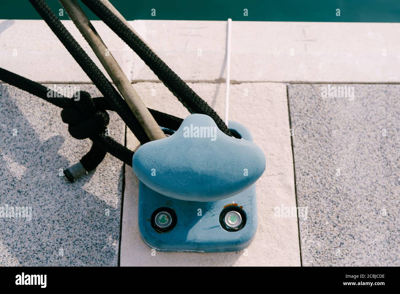 New modern maritime bollard in a yacht marina Stock Photo - Alamy