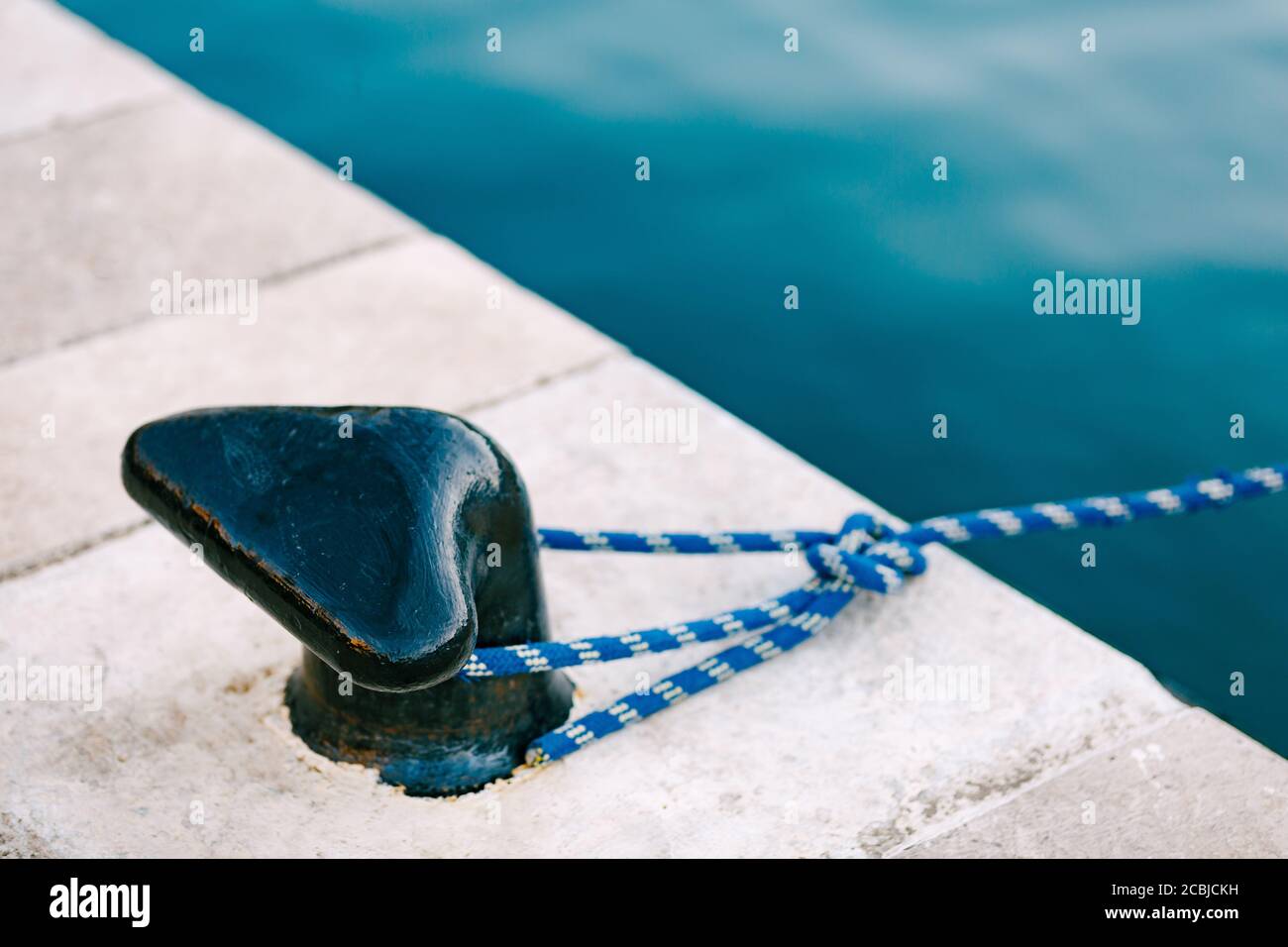 New modern maritime bollard in a yacht marina Stock Photo - Alamy