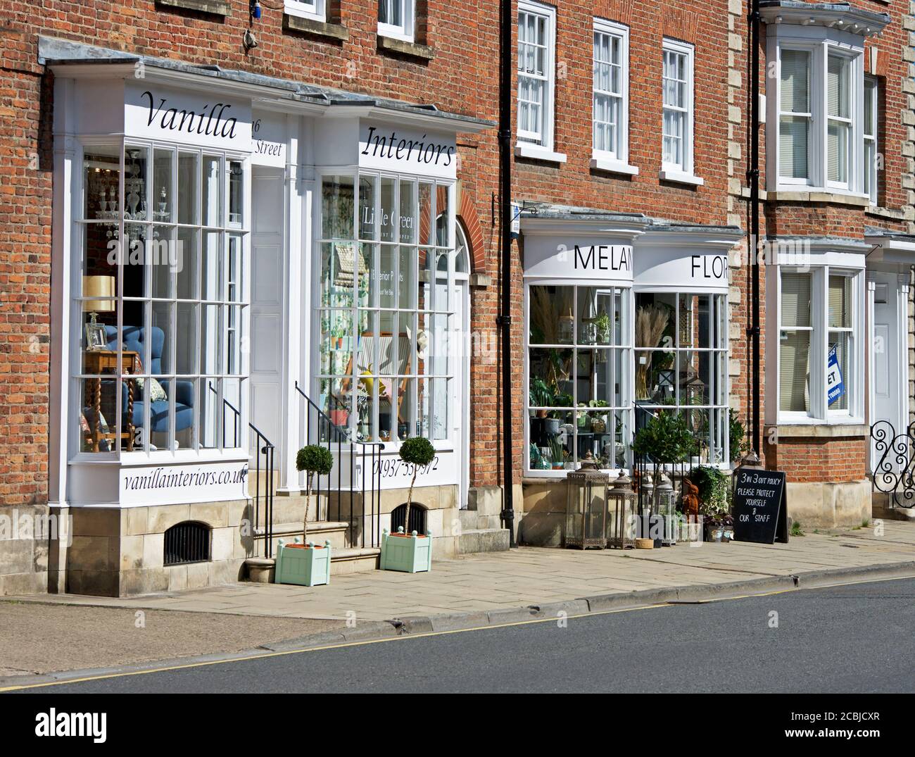 Upmarket shops in Bridge Street, Tadcaster, North Yorkshire, England UK ...