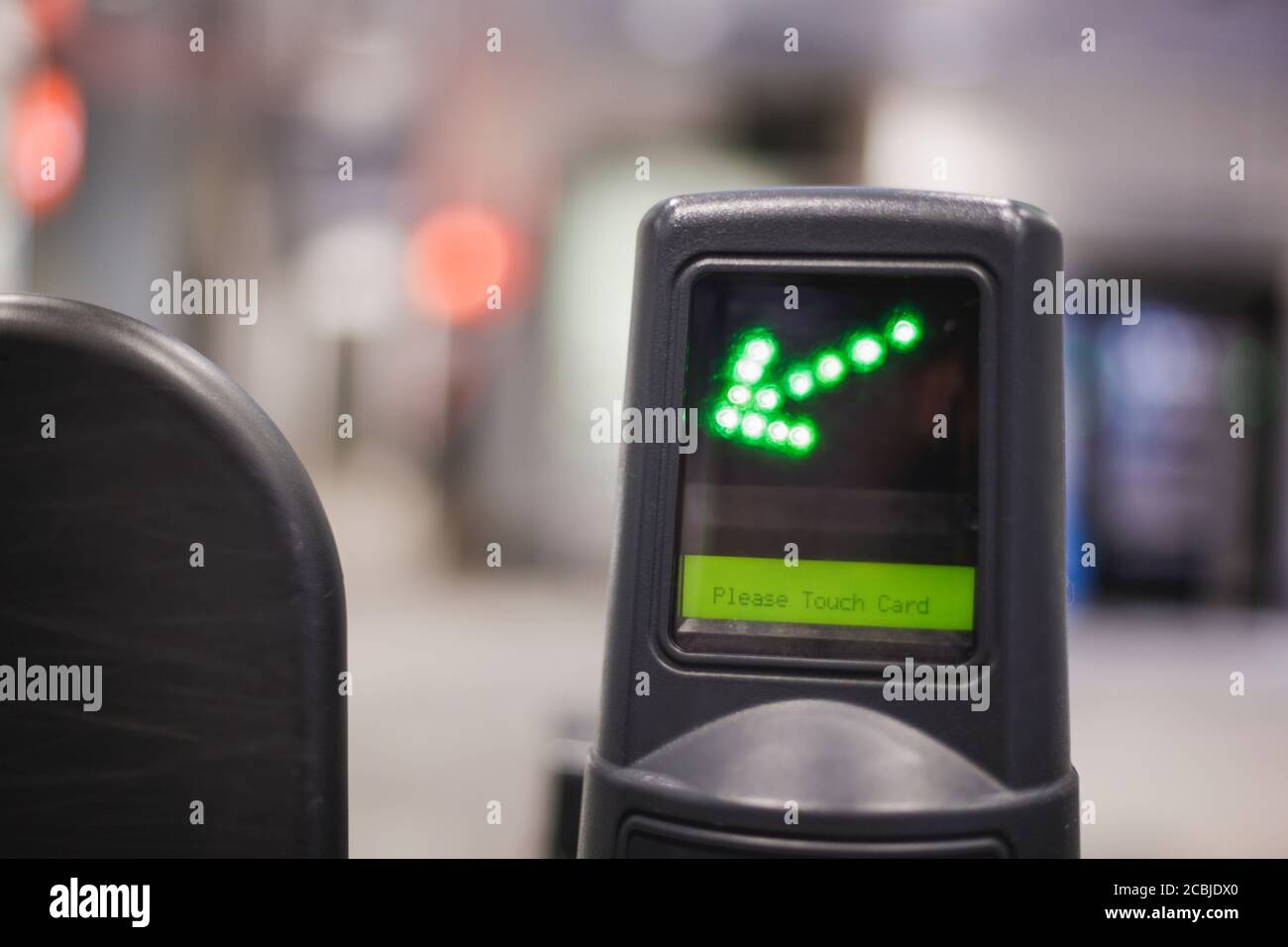 Touch your ticket and go. Subway entrance gate Stock Photo - Alamy