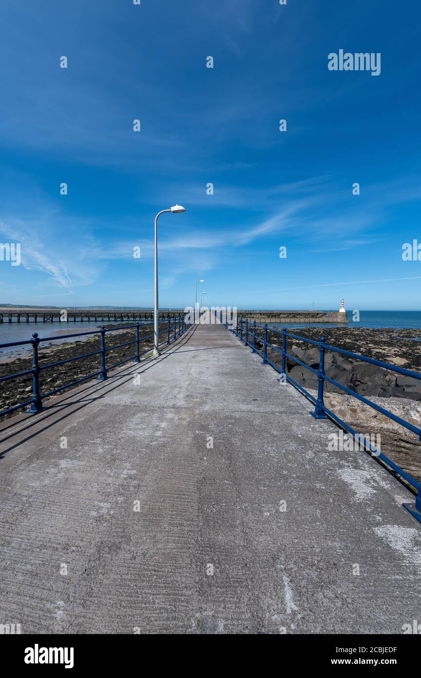 Amble Pier and Lighthouse, Amble, Northumberland, UK Stock Photo - Alamy