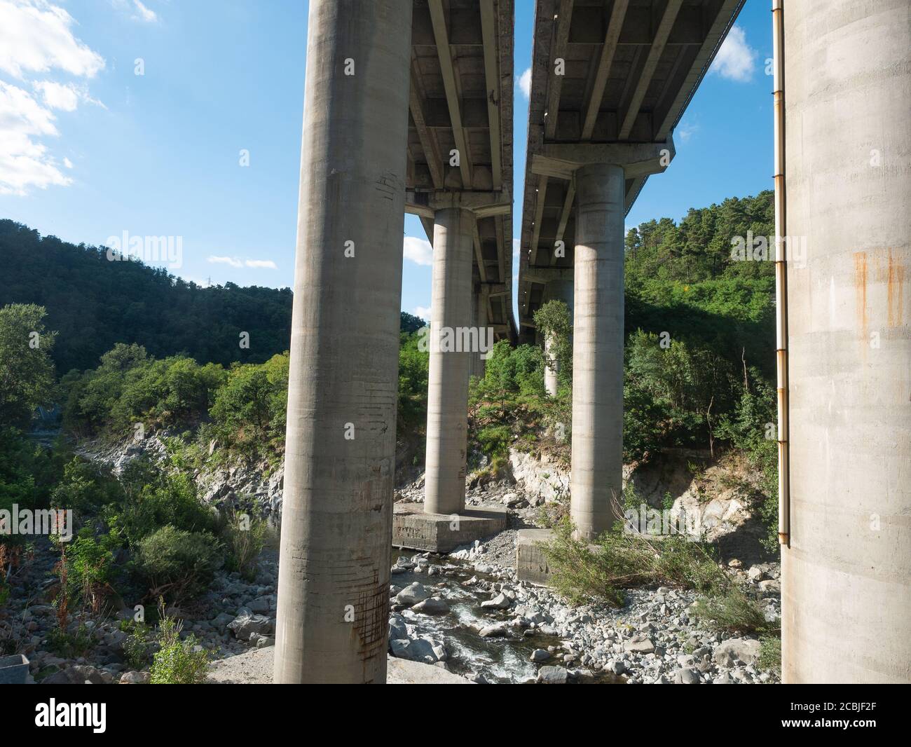 Multiple Lane Highway bridge with reinforced concrete columns over a ...