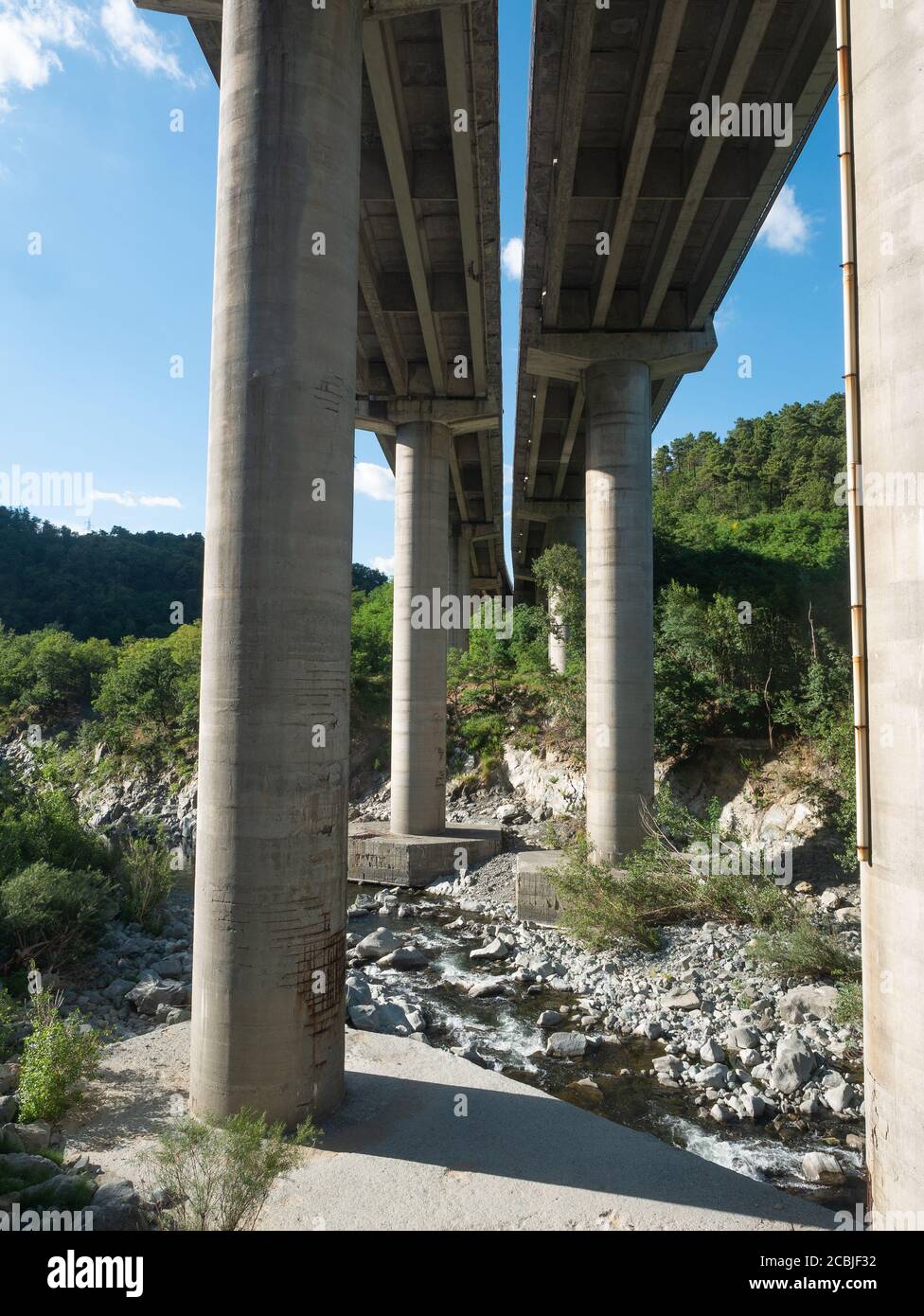 Multiple Lane Highway bridge with reinforced concrete columns over a ...
