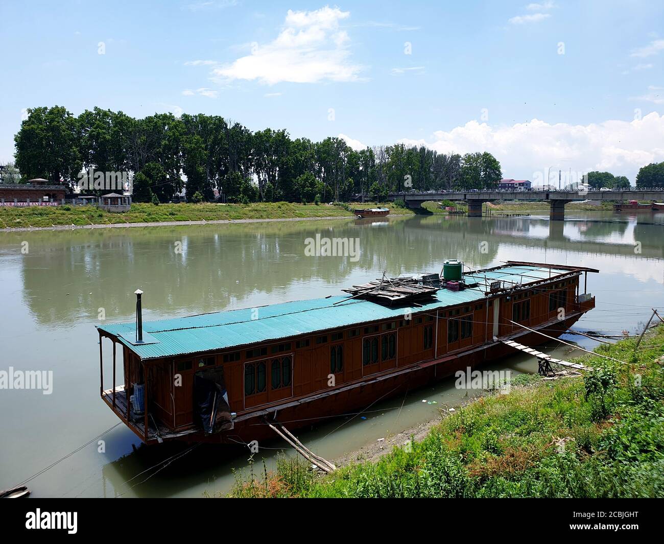 Wooden houseboats and bridges looks beautiful Stock Photo - Alamy