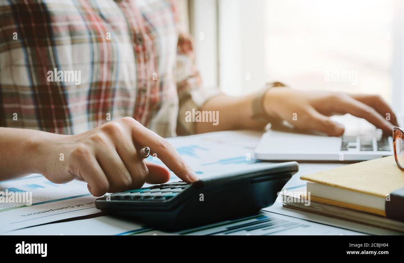 Business woman working in finance and accounting Analyze financial ...