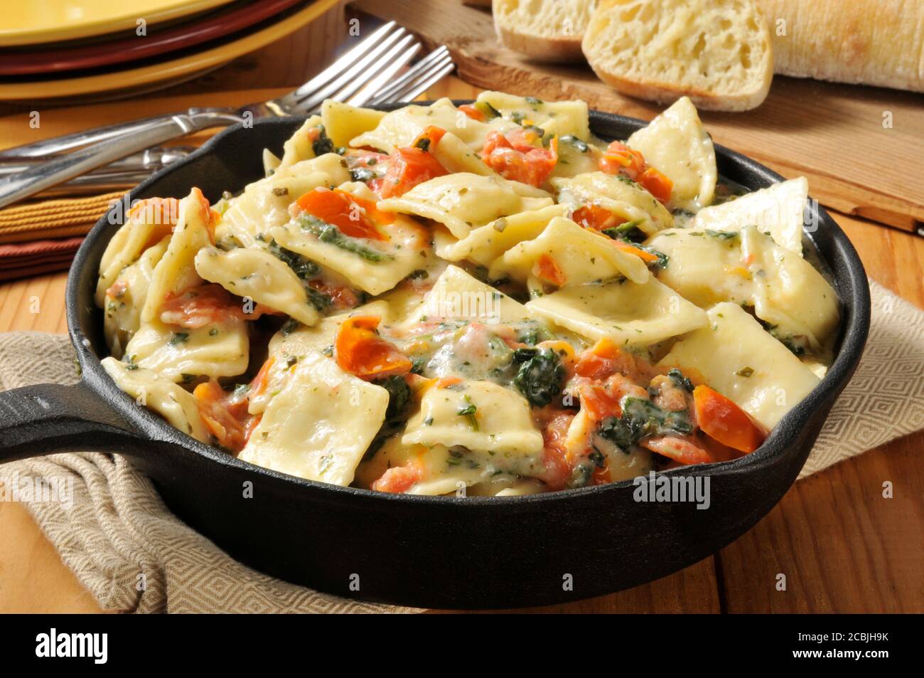 Gourmet lobster ricotta cheese ravioli served in a cast iron skillet ...