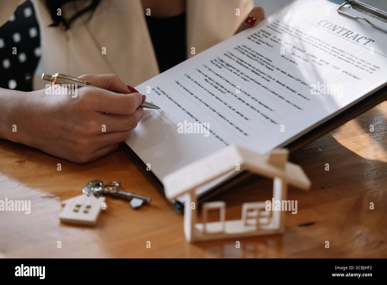 Real estate agent offer hand for customer sign agreement contract ...