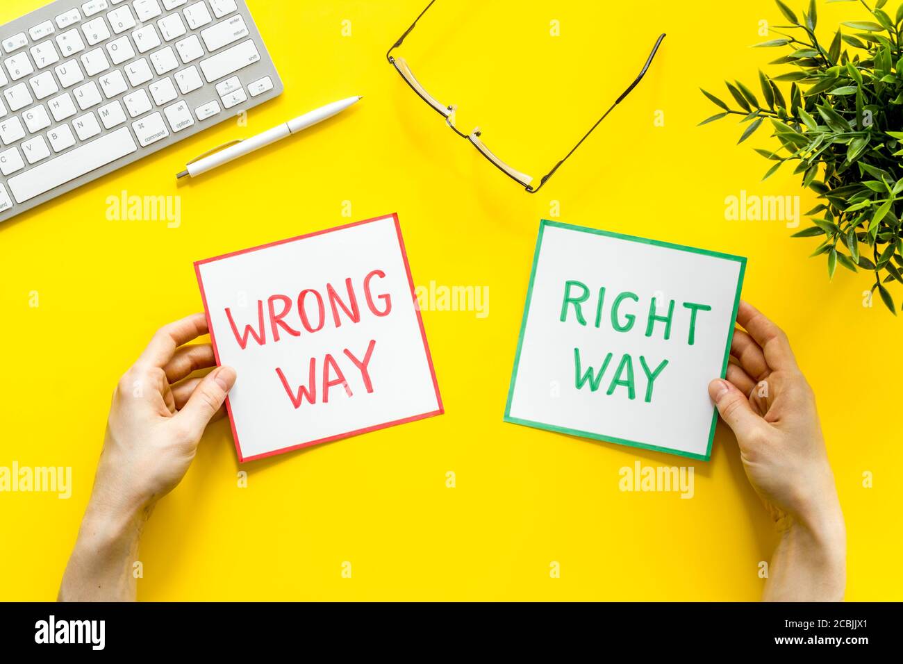 Choice concept. Right and wrong way icons, female hands top view Stock ...