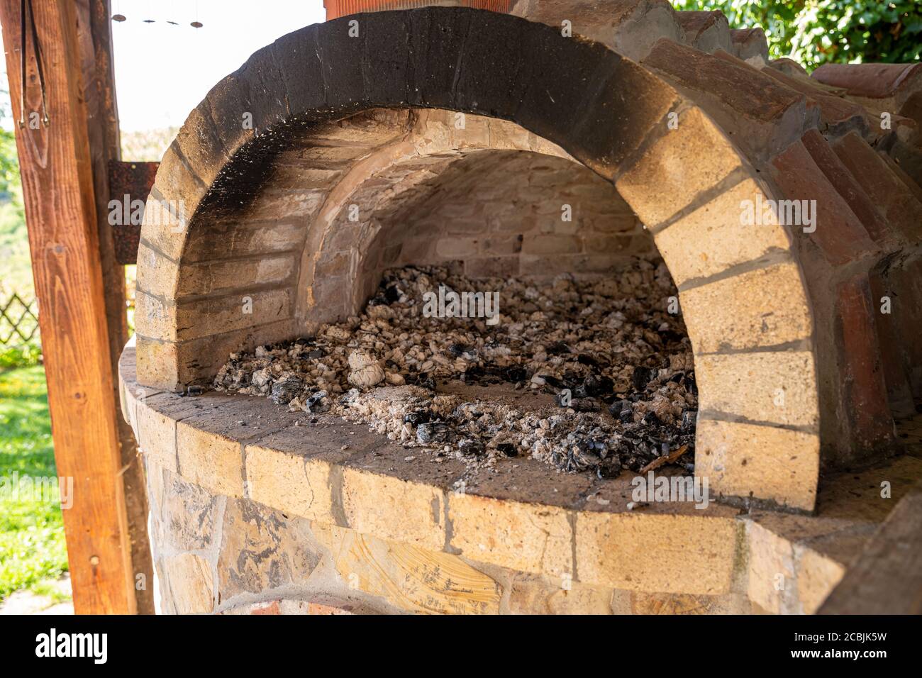 Burning oak wood in a furnace. Stove in country house. Bright flame ...