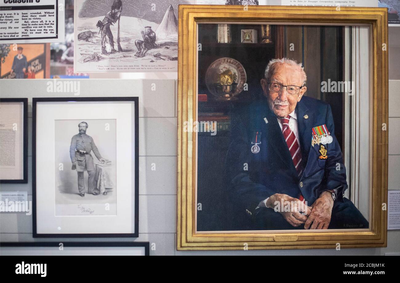 A portrait of Captain Sir Tom Moore, by artist Alex Chamberlin, is ...