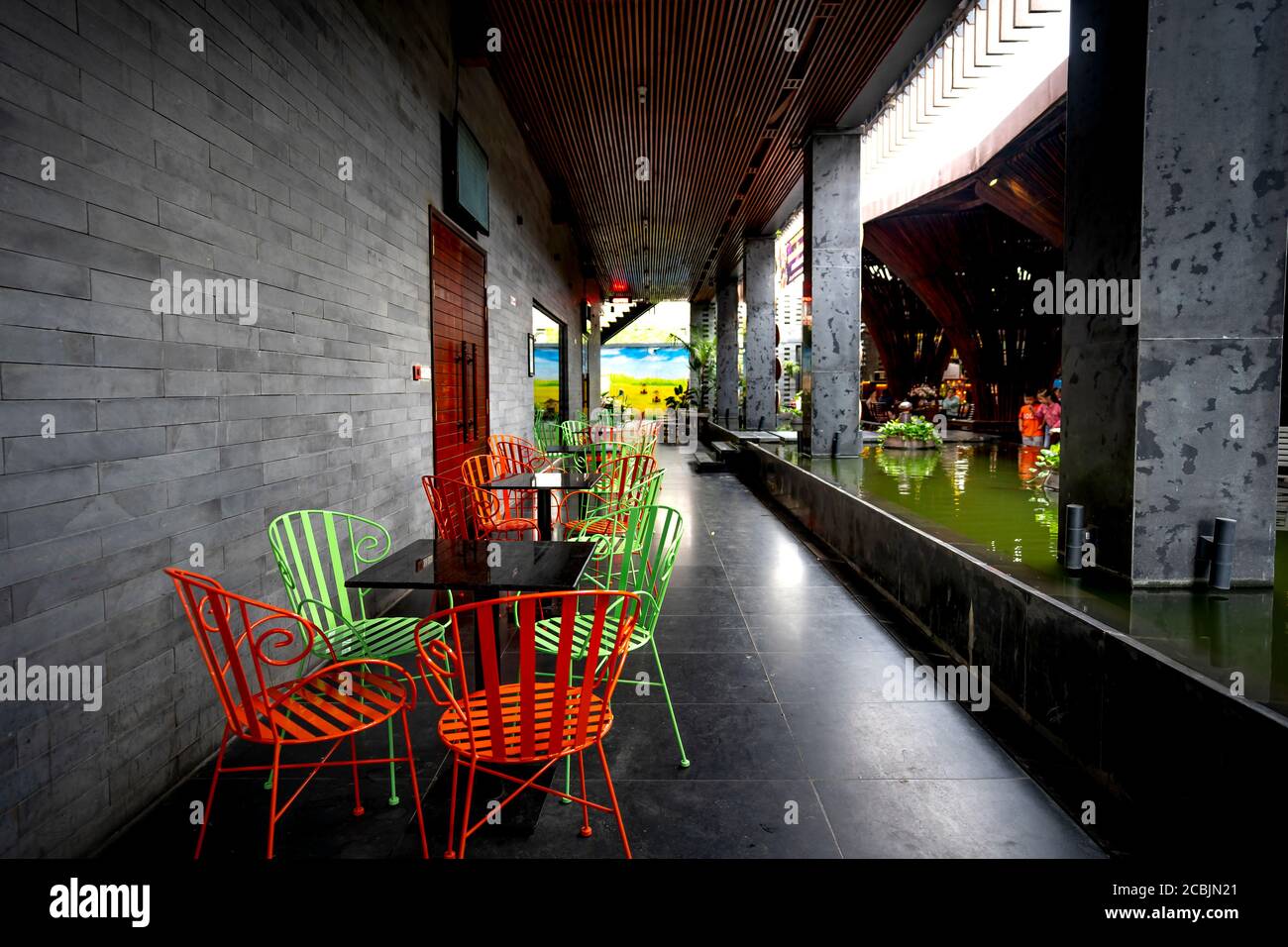 Cozy cafe red chairs hi-res stock photography and images - Alamy