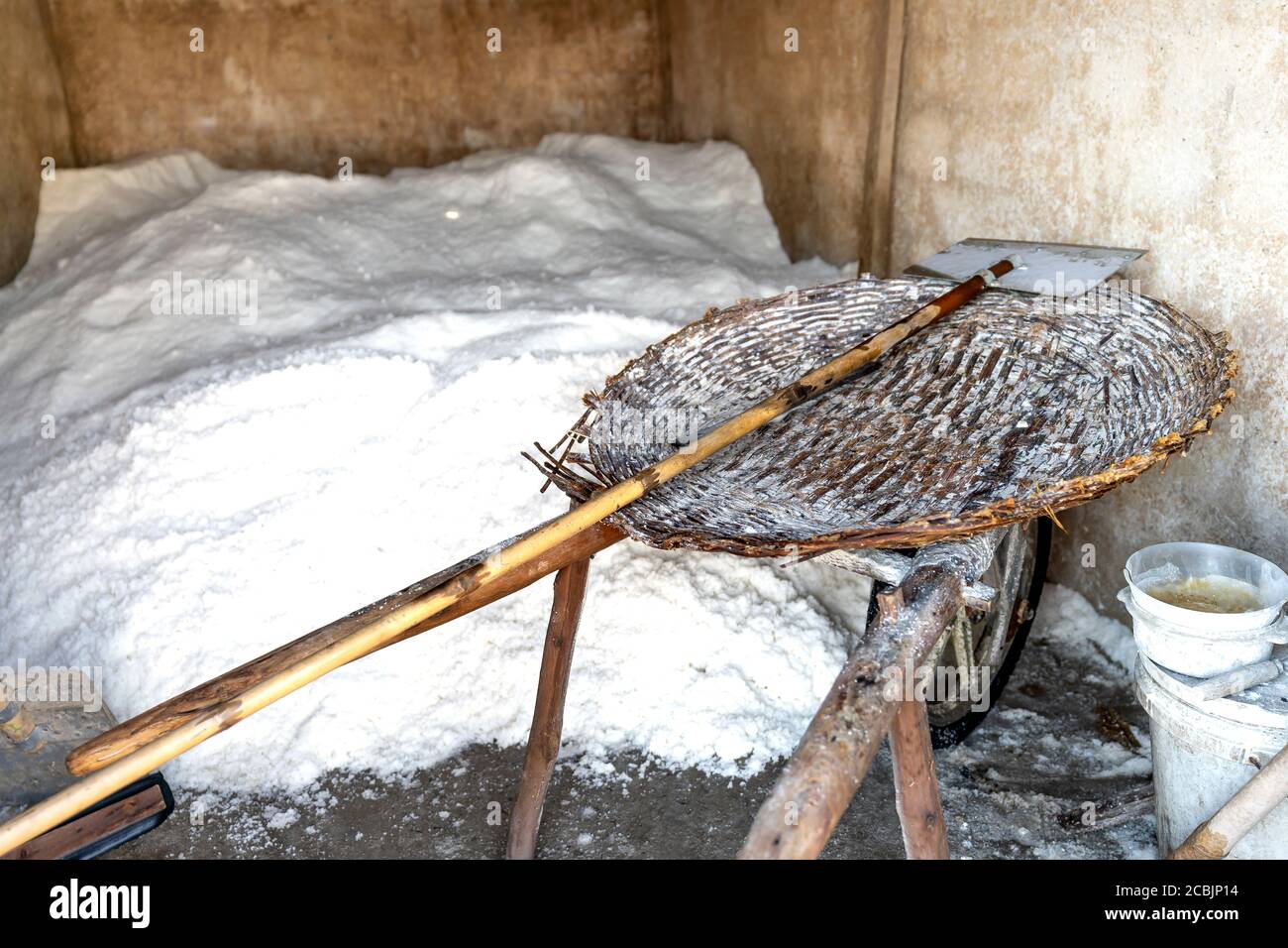 The image of a wooden wheelbarrow for transporting salt of salt farmers ...