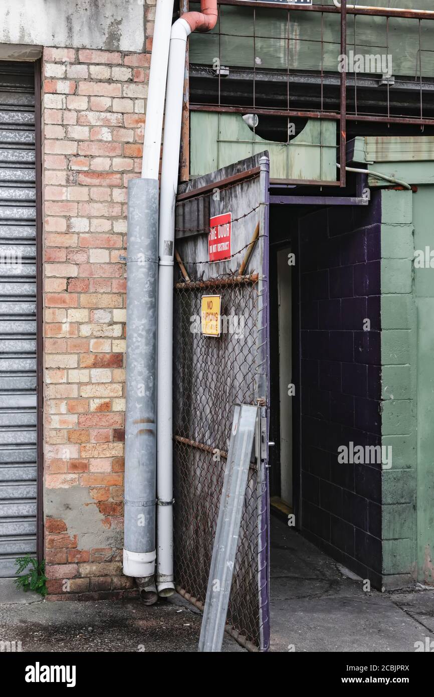 A back door of an industrial building Stock Photo - Alamy