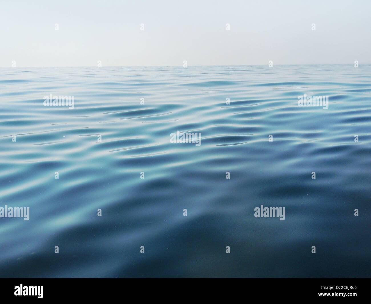 Clear deep blue water Stock Photo - Alamy