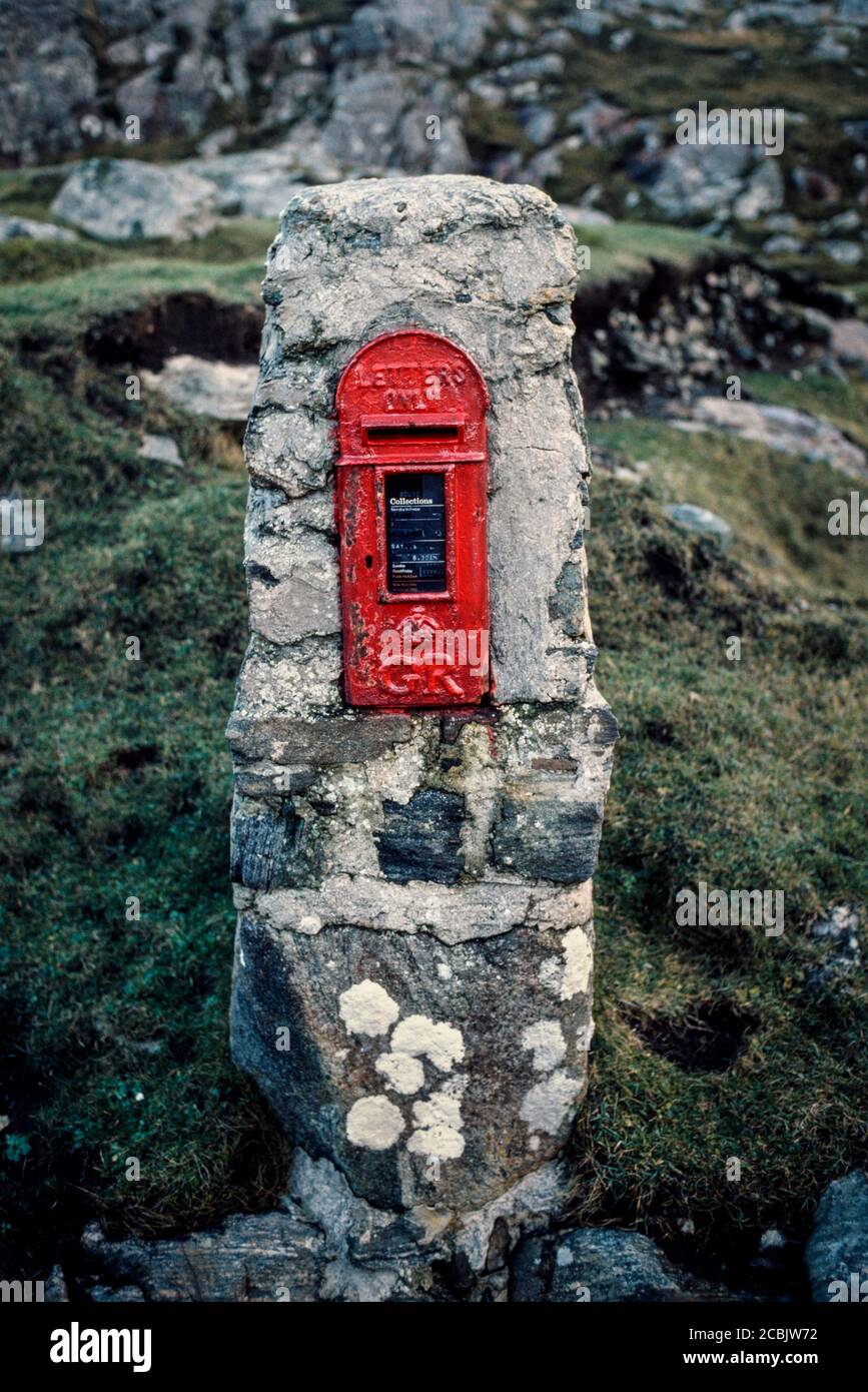 Royal Mail post box in a stone pillar Isle of Coll Inner Hebrides ...