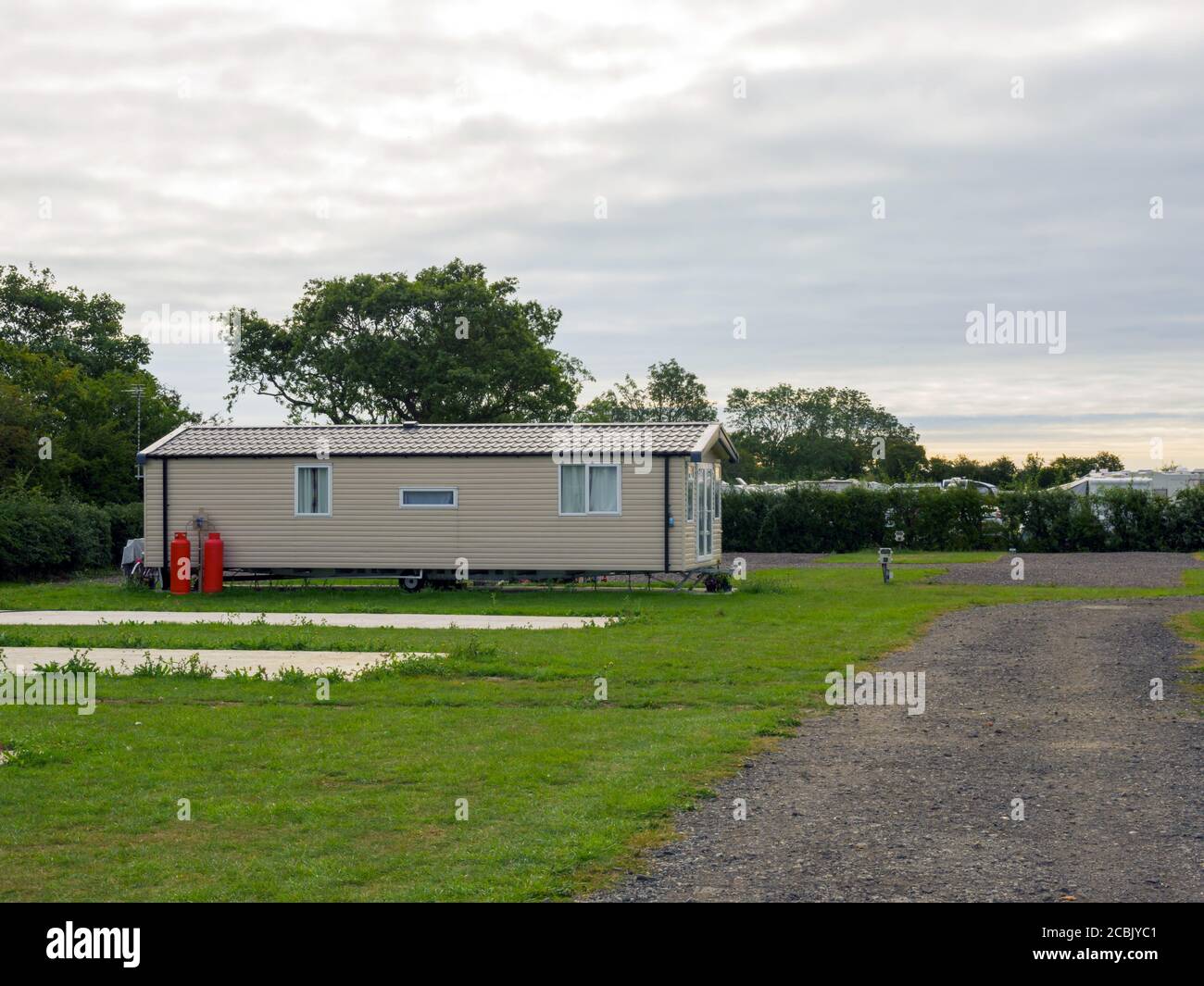caravan on typical british summer holiday park Stock Photo - Alamy