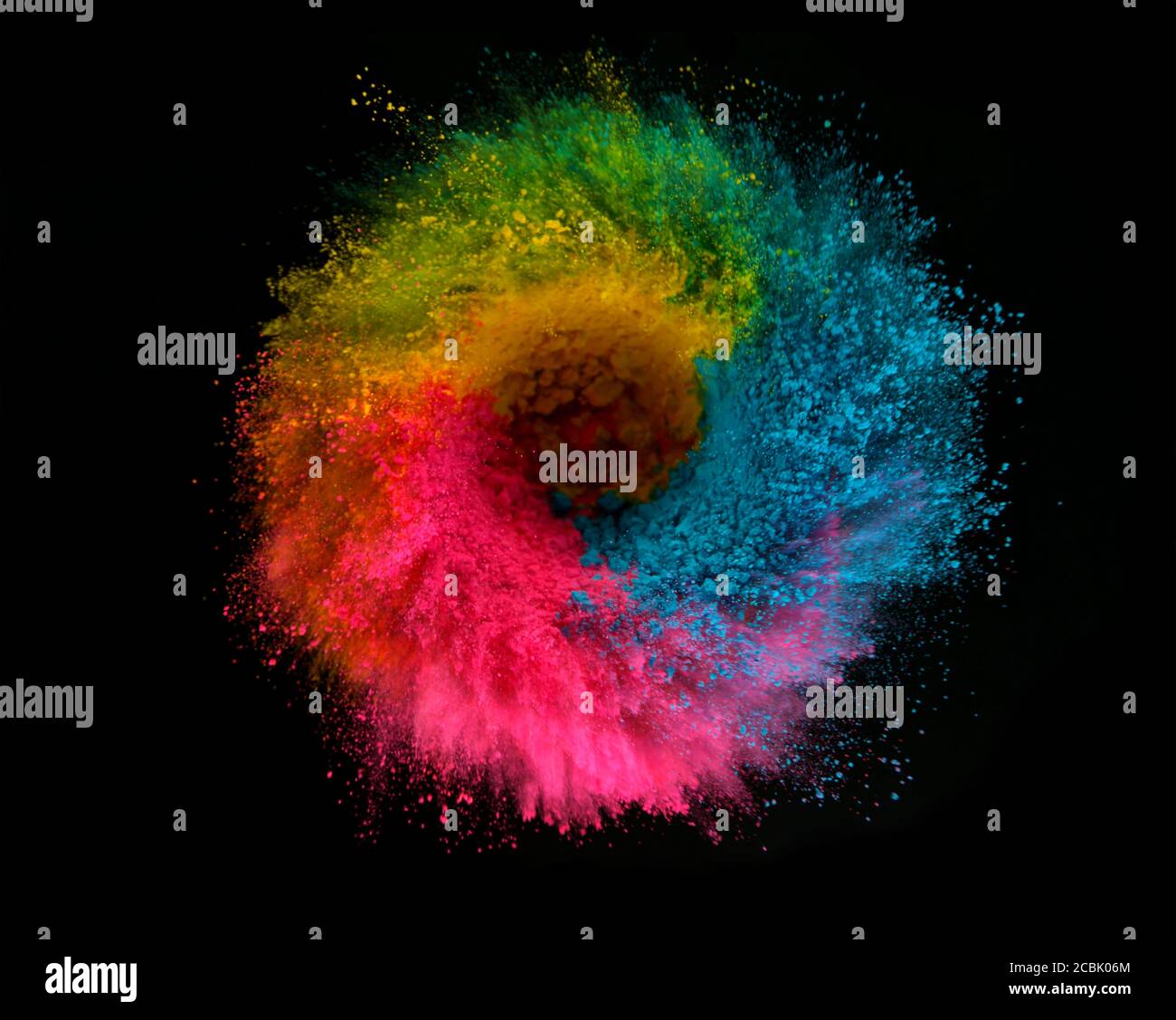 Coloured powder explosion isolated on black background Stock Photo - Alamy