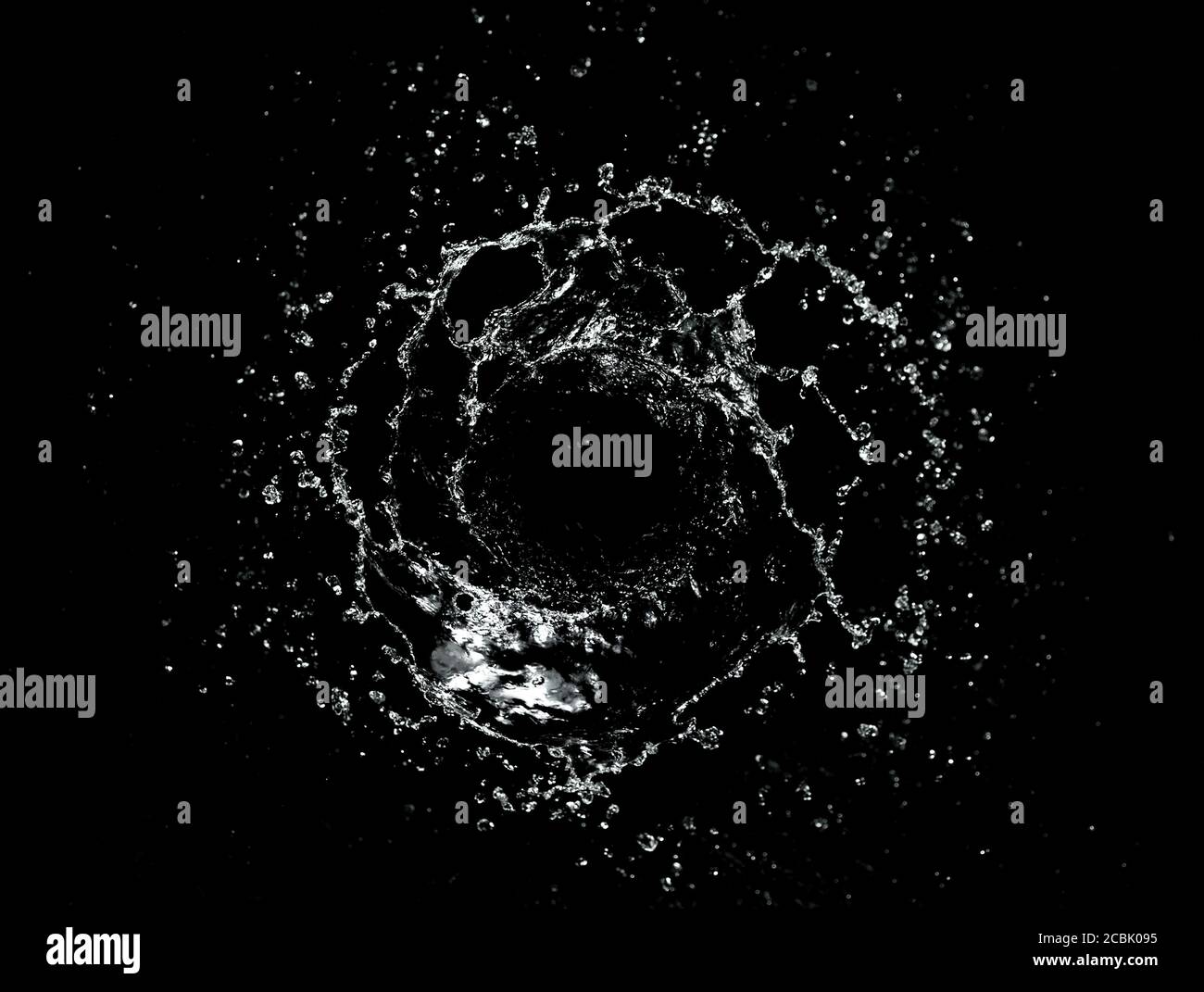 Abstract twister shape of water splash, isolated on black background ...