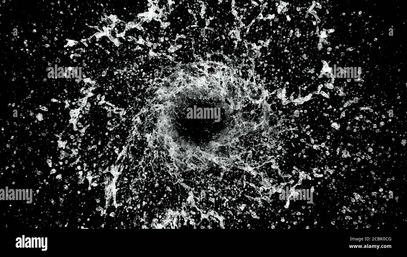 Abstract twister shape of water splash, isolated on black background ...