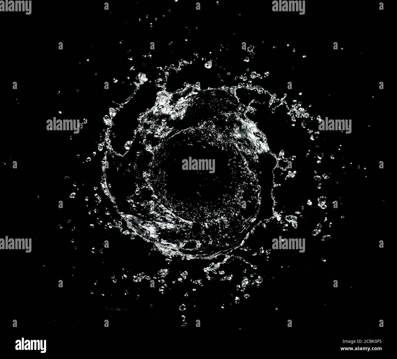 Abstract twister shape of water splash, isolated on black background ...