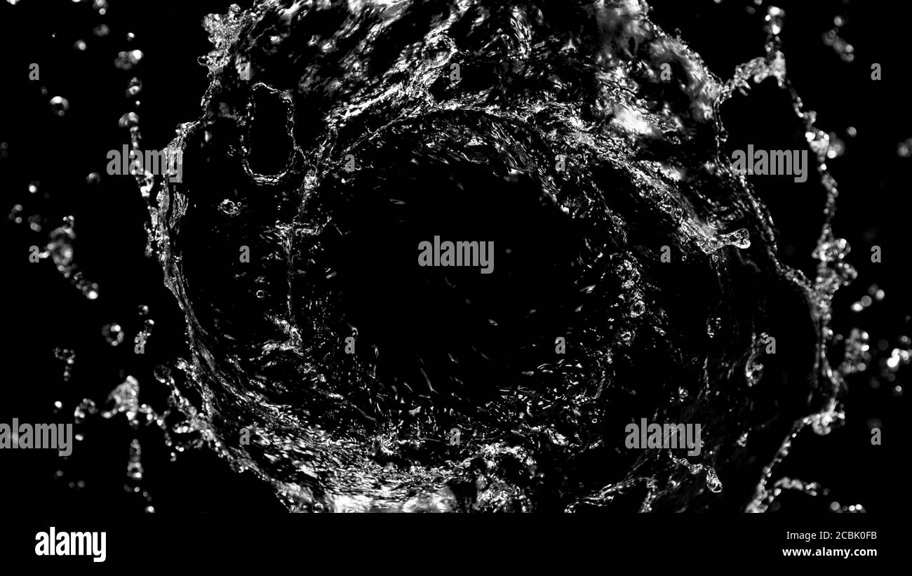 Abstract twister shape of water splash, isolated on black background ...