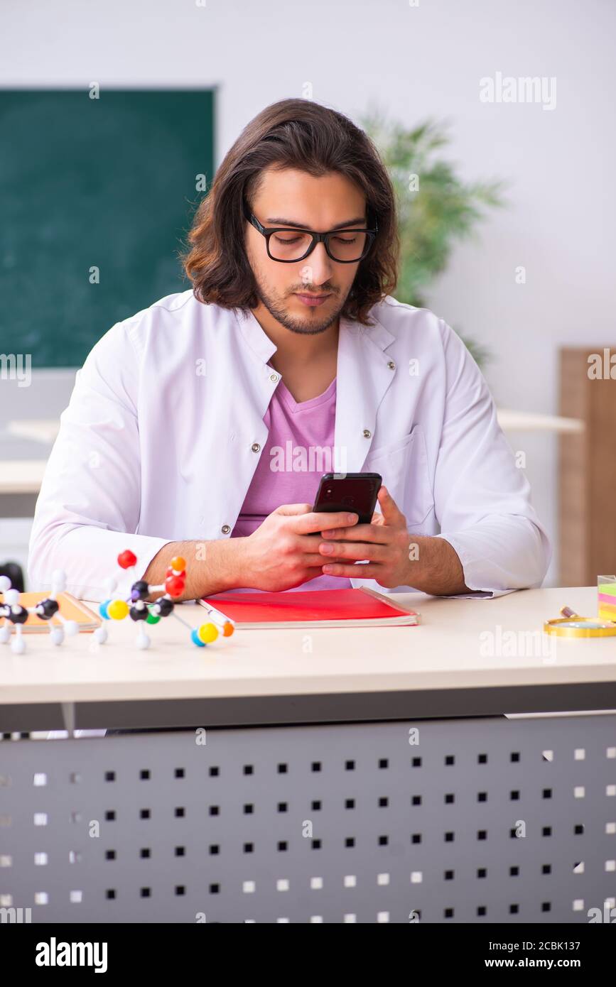 Young physicist in the classroom Stock Photo - Alamy