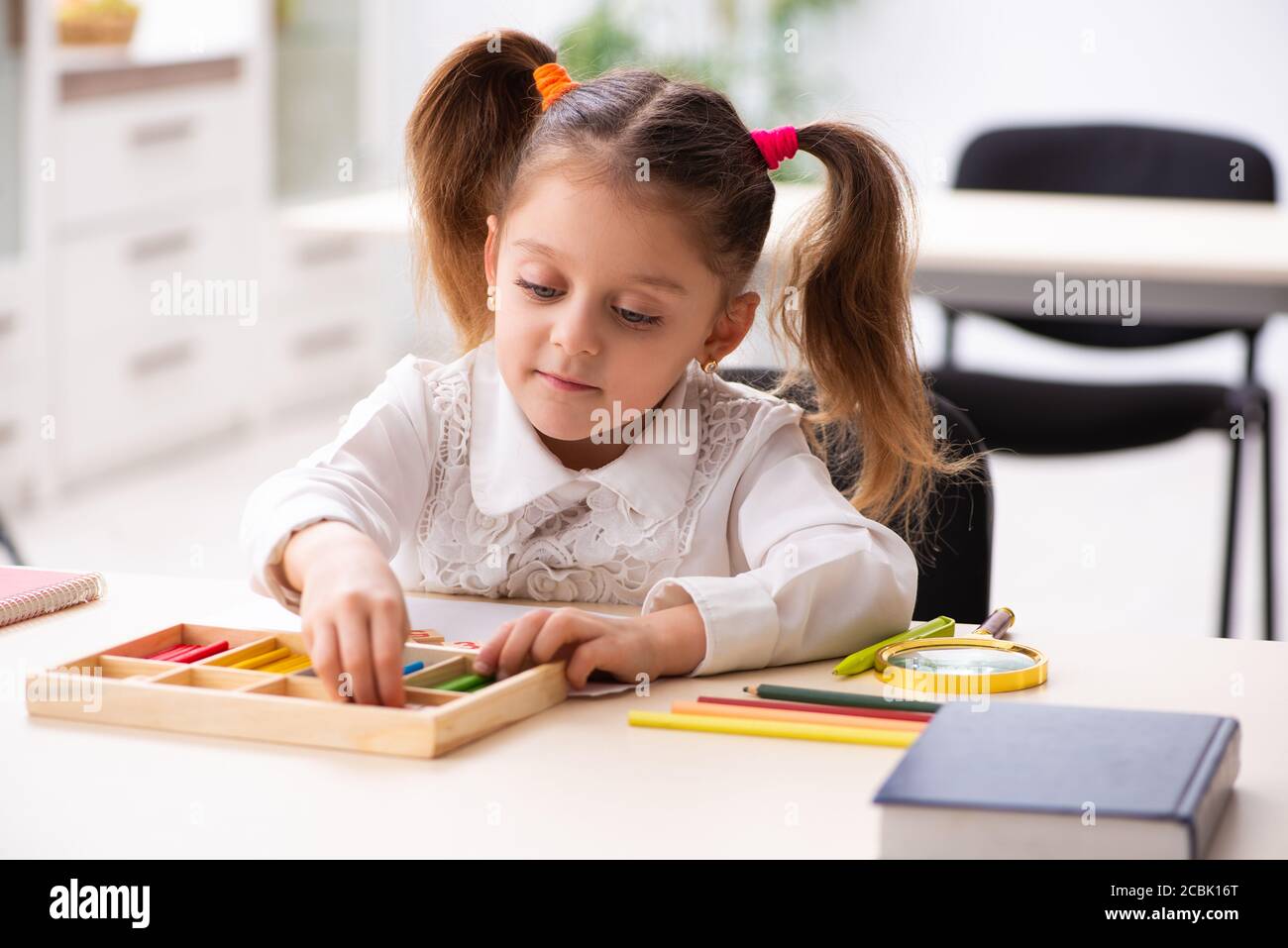 Small girl in the early development concept Stock Photo - Alamy