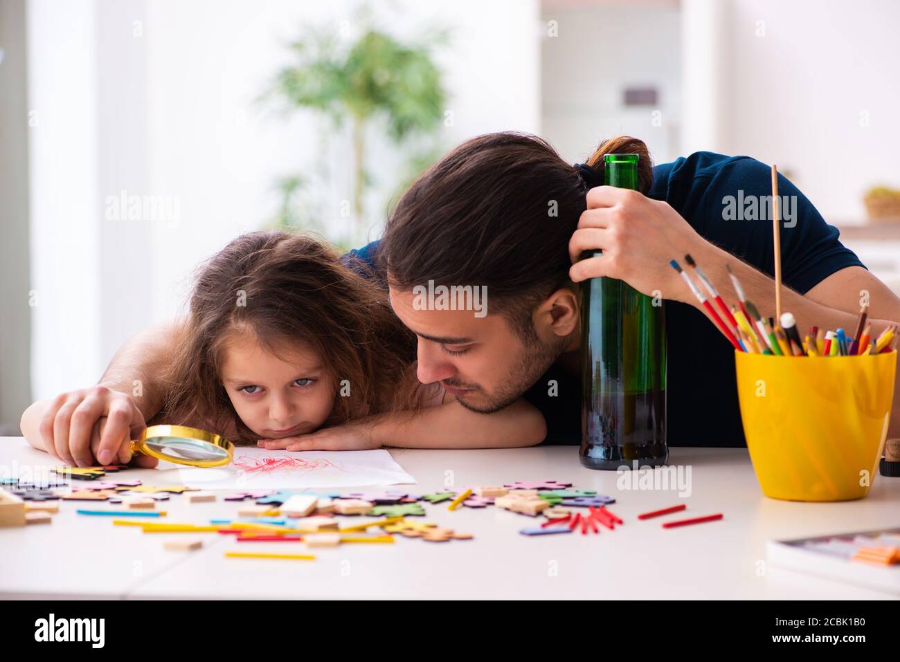 Drunk father and little girl at home Stock Photo - Alamy
