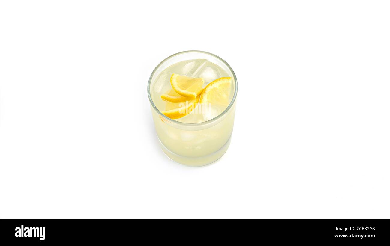 Glass with lemon lemonade and ice on a white background Stock Photo - Alamy