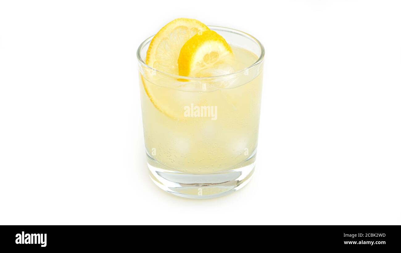 Glass with lemon lemonade and ice on a white background Stock Photo - Alamy