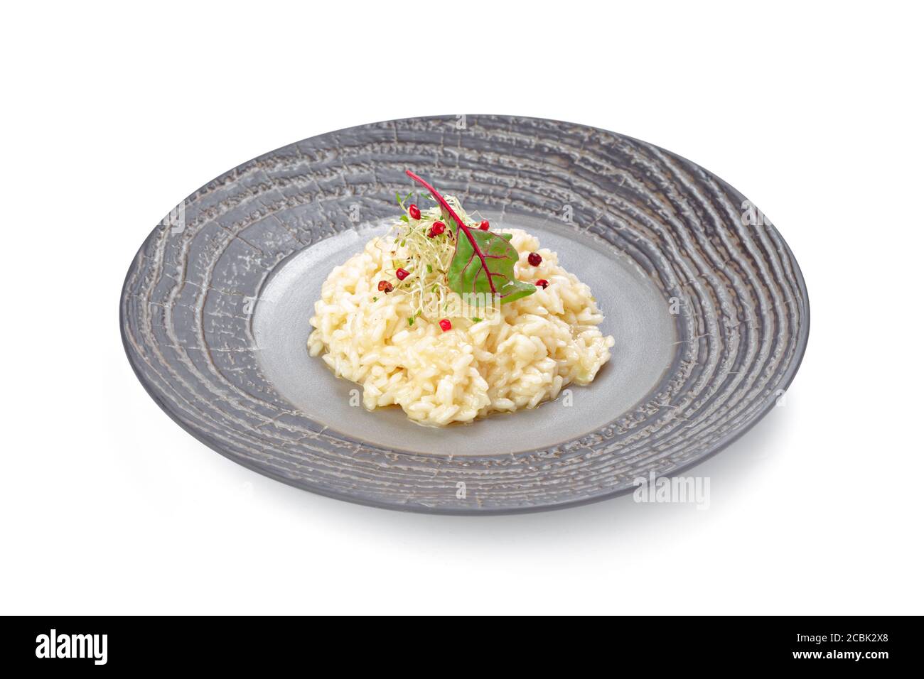 Prepared white rice in plate isolated on white Stock Photo - Alamy